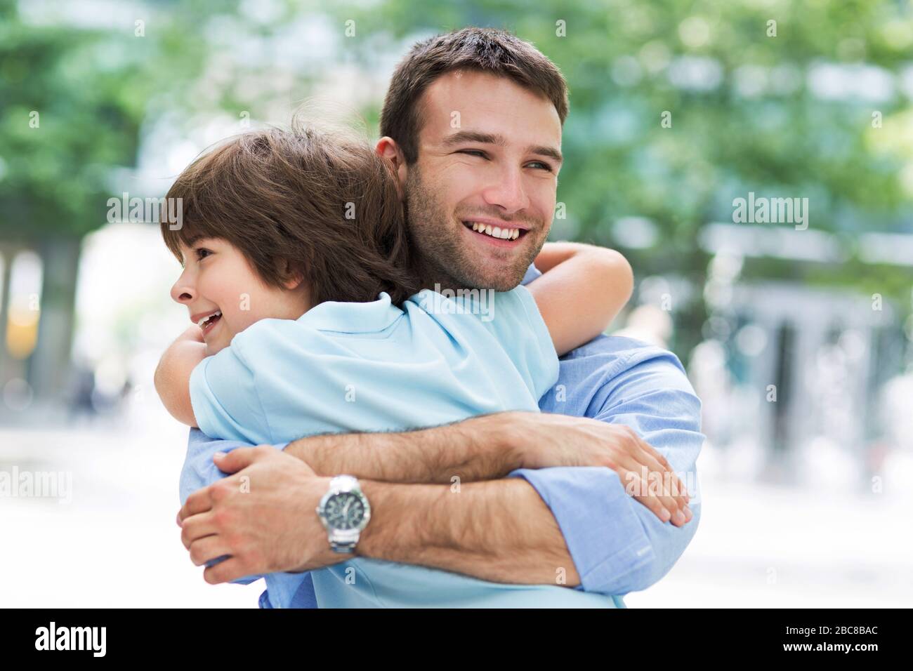 Father and child playing outdoors Stock Photo - Alamy