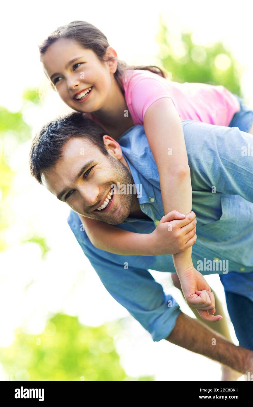 Father and child playing outdoors Stock Photo - Alamy