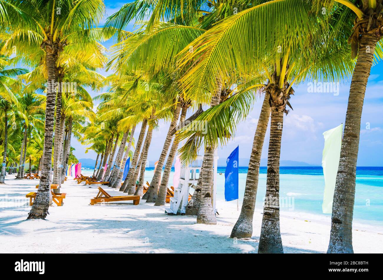 Tropical beach at Panglao Bohol island with chairs on the white sand ...