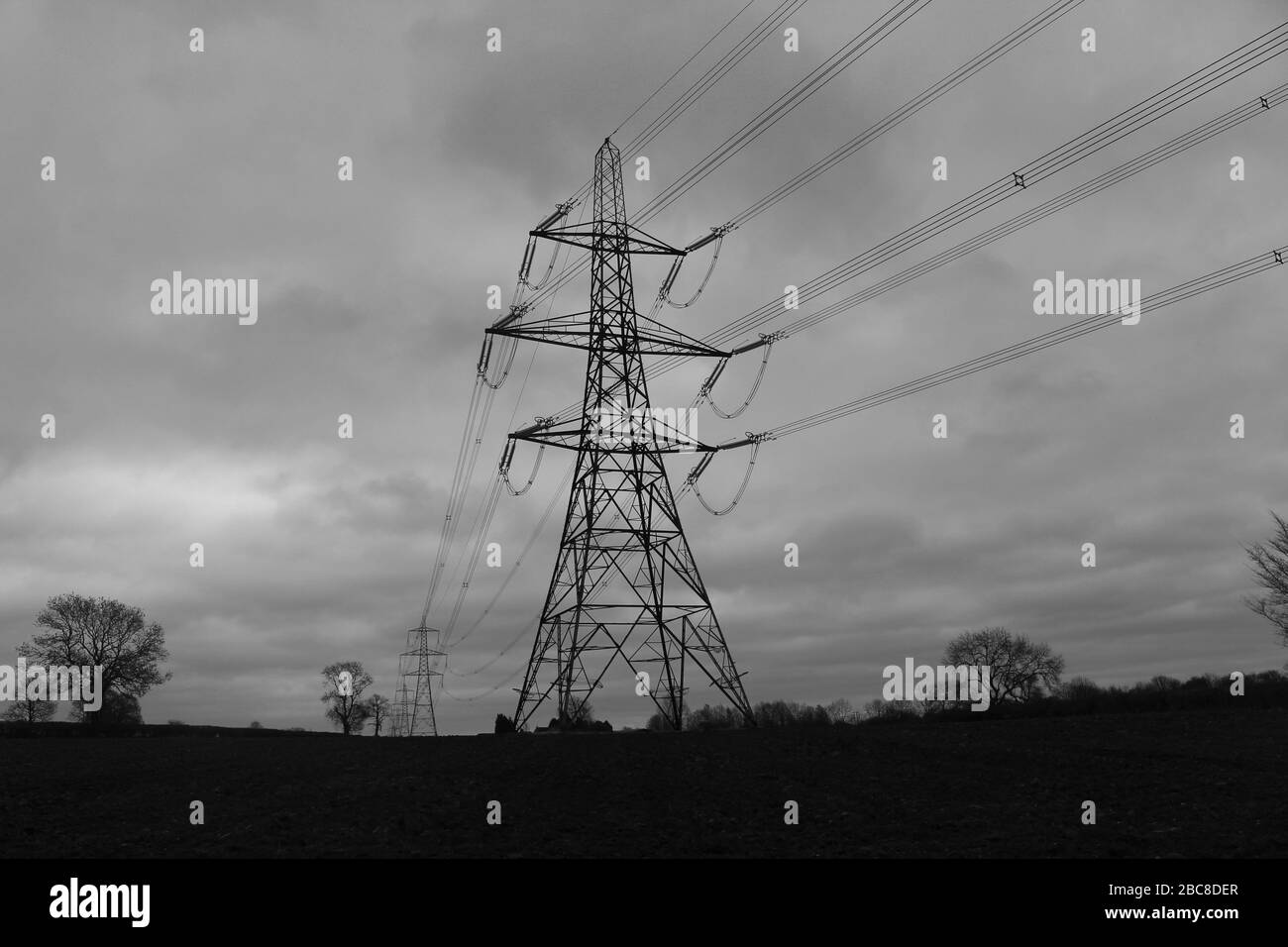 Black and white transmission tower hi-res stock photography and images ...
