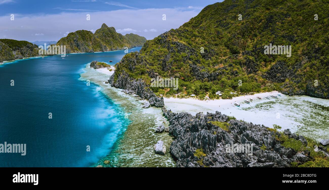 Aerial panoramic view of karst sharp cliffs of limestone island on ...