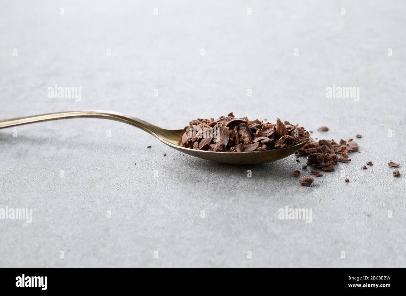 Cocoa, spoon, grated chocolate Stock Photo - Alamy