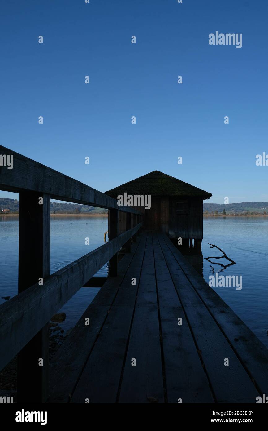 Boathouse, jetty, lake, water, blue sky, blue hour, wood Stock Photo ...
