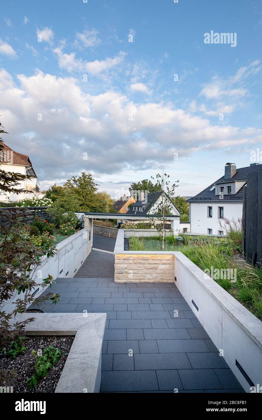 Modern access path to a single-family home Stock Photo - Alamy