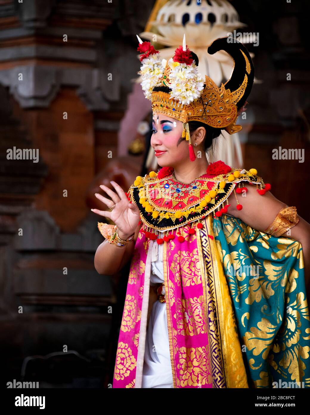 Vertical portrait of a female character in Barong dance in Bali ...