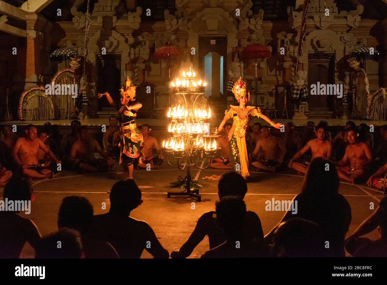 Horizontal view of a Kecak Fire Dance in Bali, Indonesia Stock Photo ...