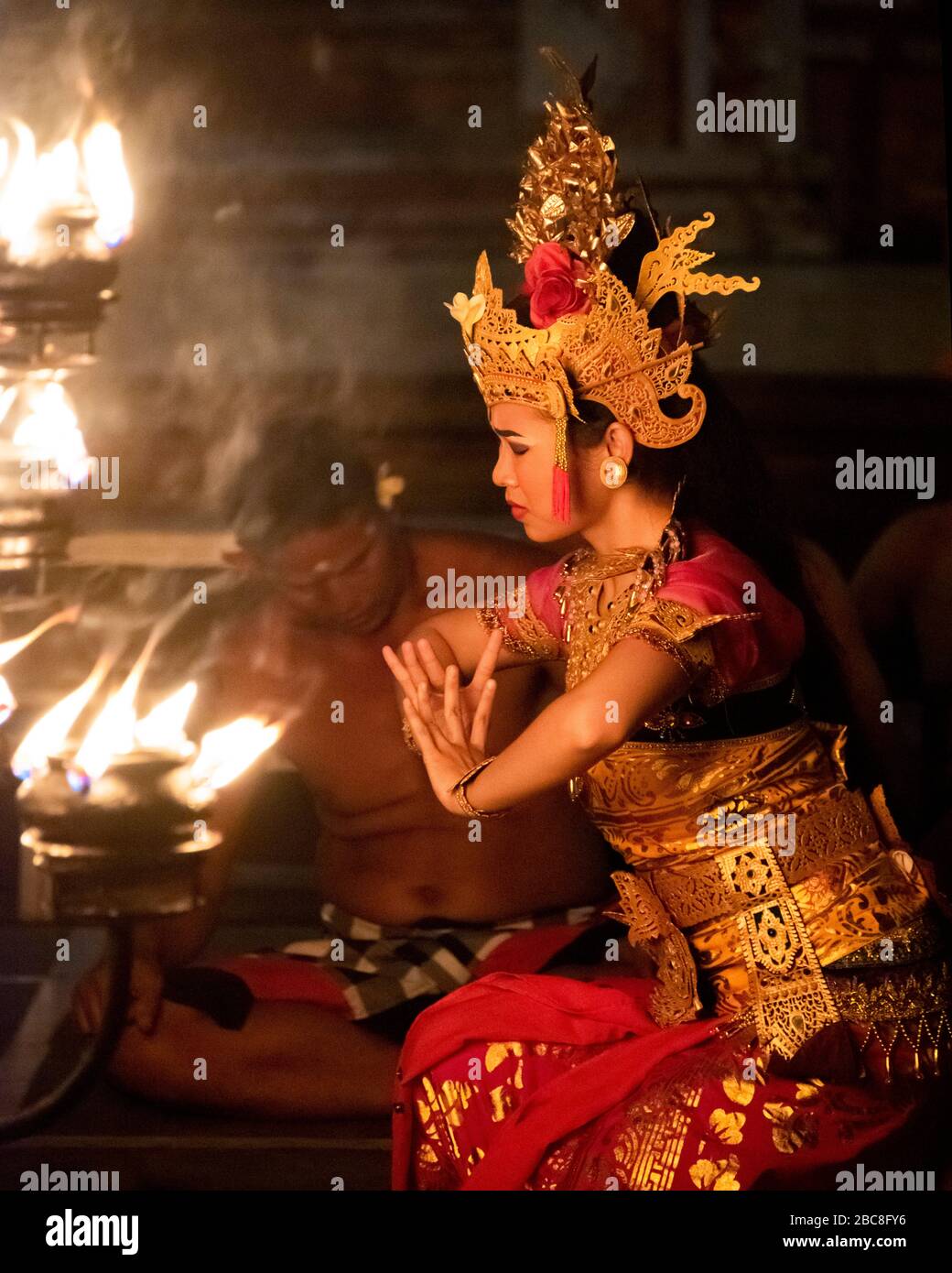 Vertical portrait of a female character in Kecak Fire Dance in Bali ...