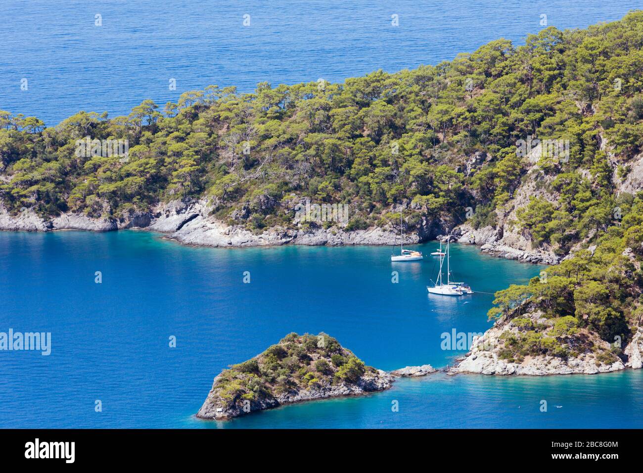 Oludeniz, or Olu Deniz, Mugla Province, Turkey. Cove with moored yachts ...
