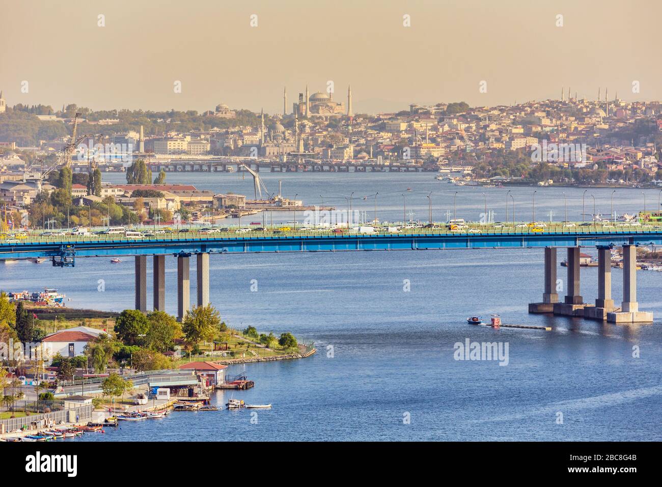 Istanbul, Turkey. The Golden Horn Bridge with the city skyline behind ...