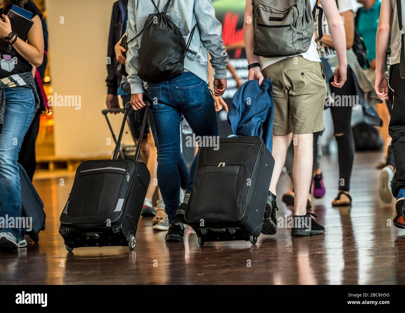 Rolling suitcases hi-res stock photography and images - Alamy