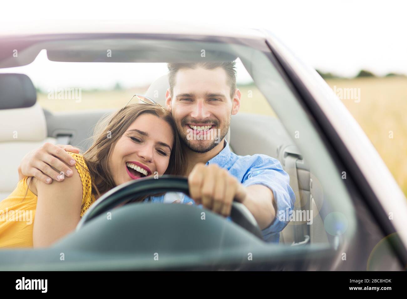 Young people on convertible car hi-res stock photography and images - Alamy