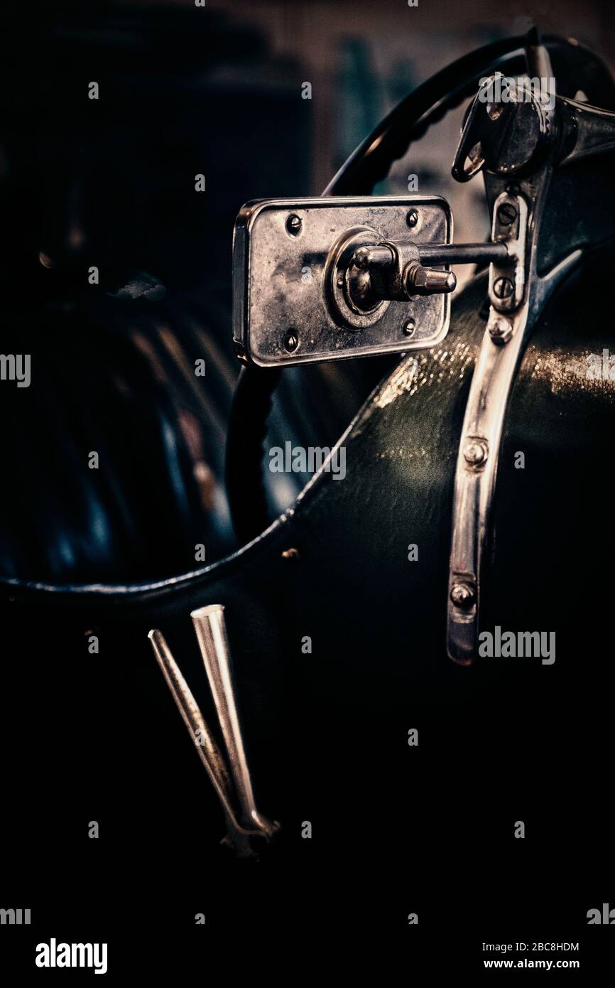 Classic car wing mirror & old fashioned handbrake at the Brooklands ...