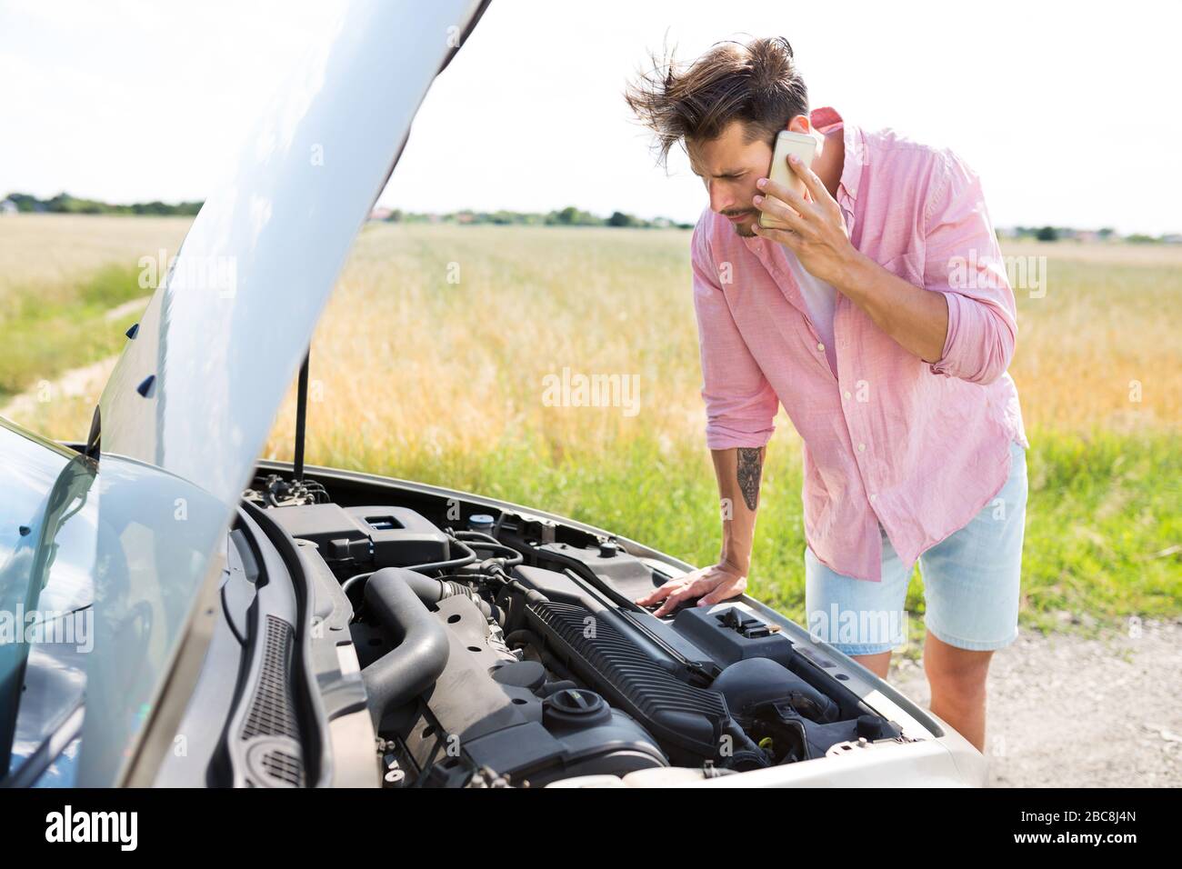 Accident man car hi-res stock photography and images - Alamy