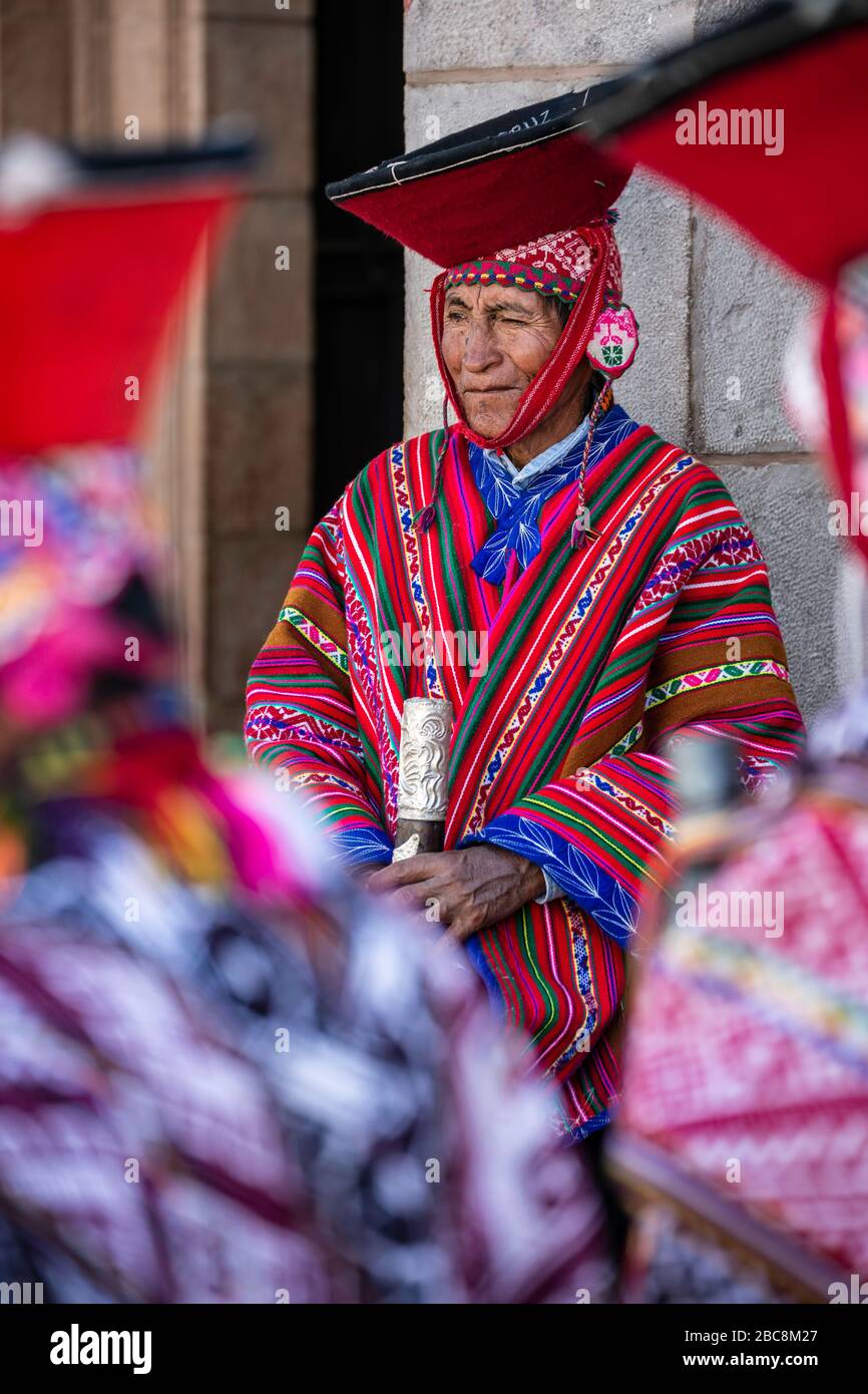 Quechua man ("varayoc" or local mayor) dressed in traditional costume ...