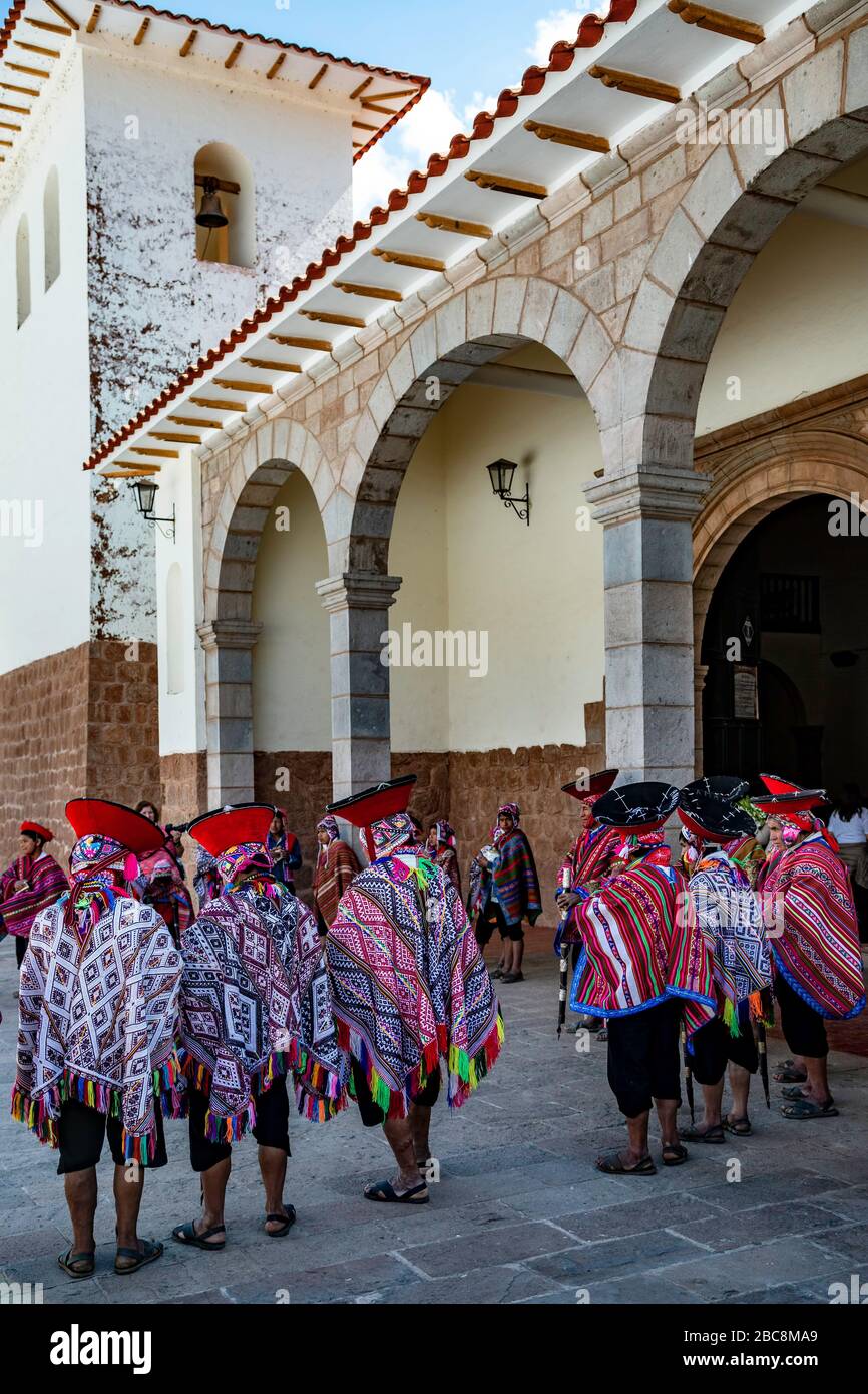 Quechua "Varayocs" (Mayors) standing in front of San Pedro Apostol ...