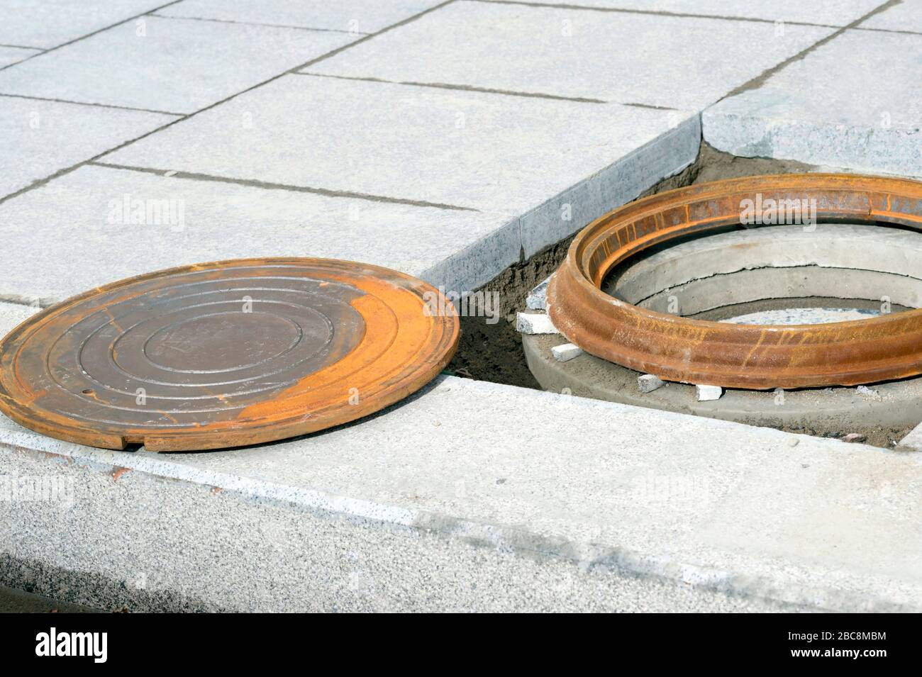 Communications manhole cover hi-res stock photography and images - Alamy