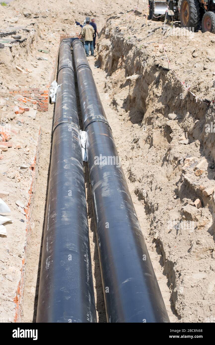 Laying of water pipelines hi-res stock photography and images - Alamy