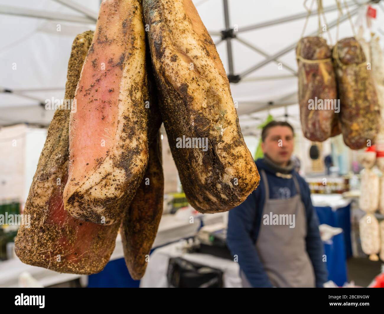 Butcher on the market in Naples Stock Photo - Alamy