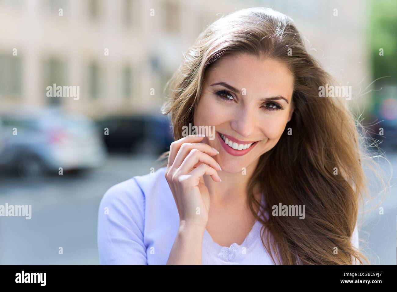 Positive young adult woman hi-res stock photography and images - Alamy