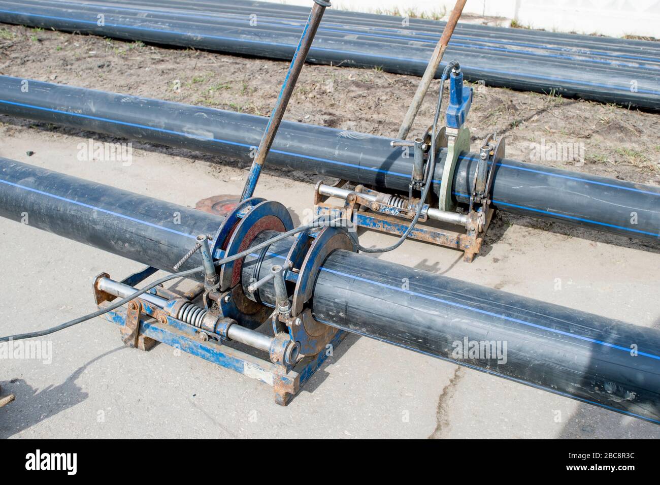 Laying of municipal Sewerage pipeline. Docking and sealing with an ...