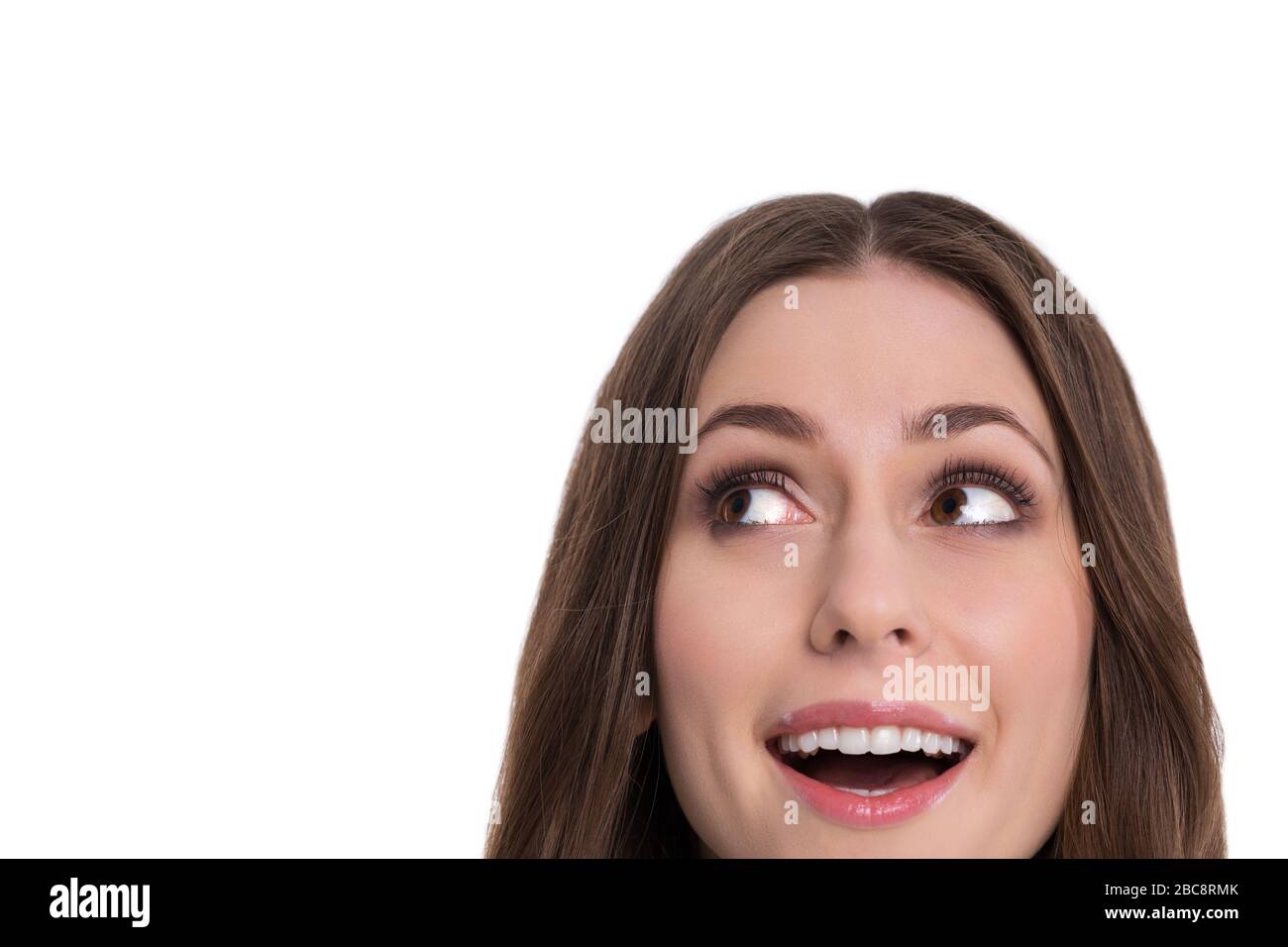Young woman looking up Stock Photo - Alamy