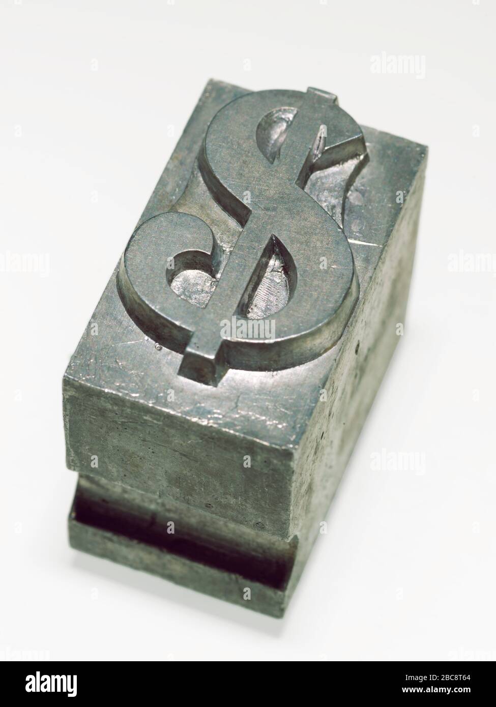 detailed US dollar sign metallic letterpress type block isolated on ...
