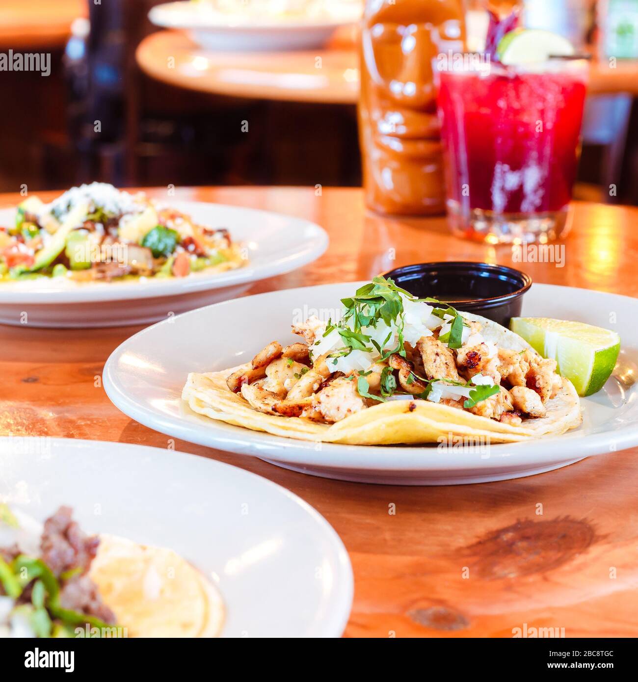 Taco platter at a traditional mexican restaurant surrounded by other ...