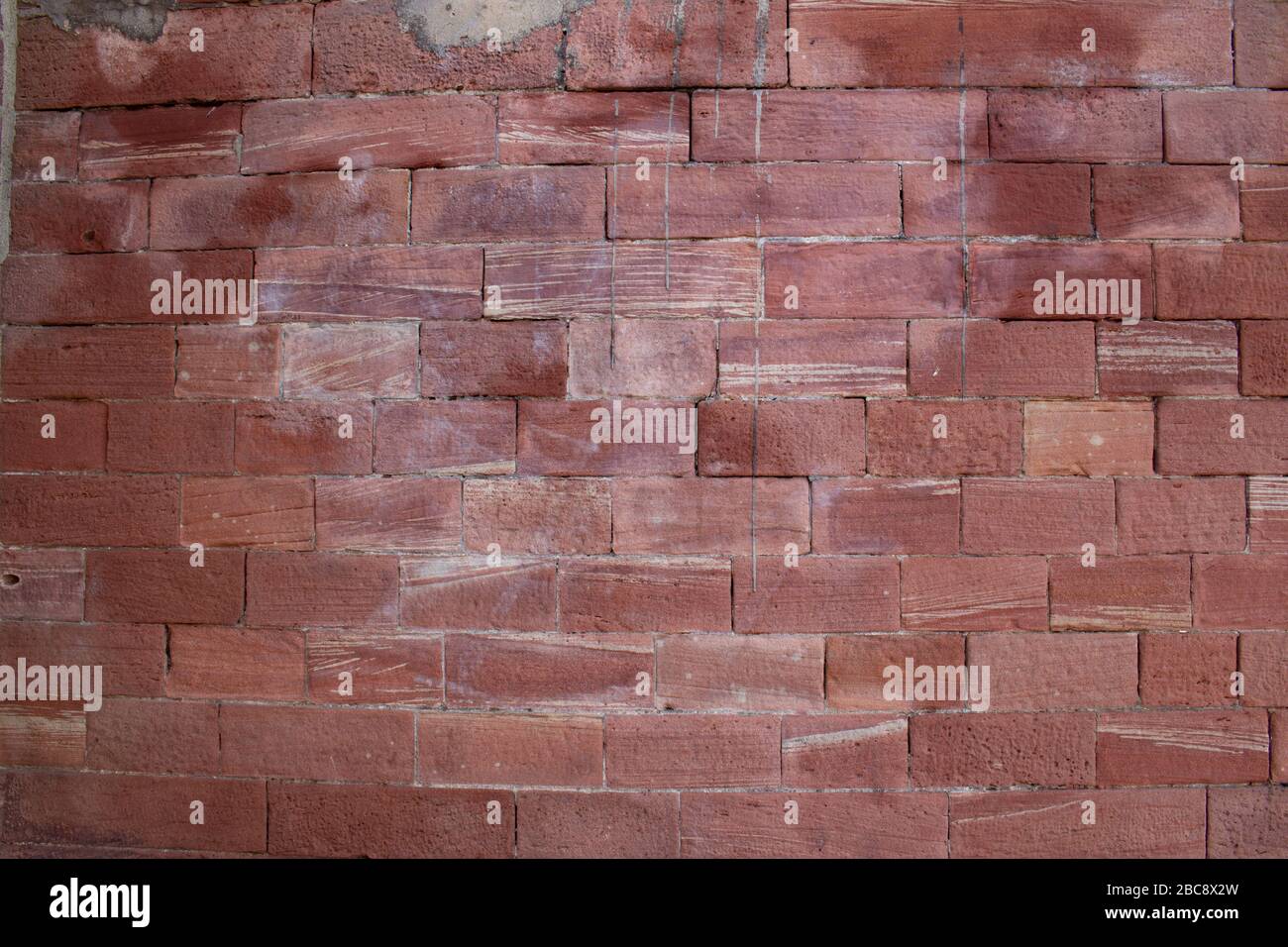 Old smooth red brick wall background Stock Photo - Alamy