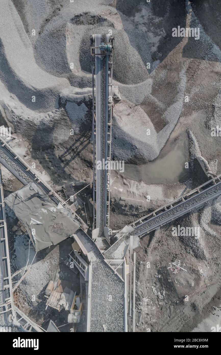 Aerial view of crushed stone quarry machine in a construction material ...