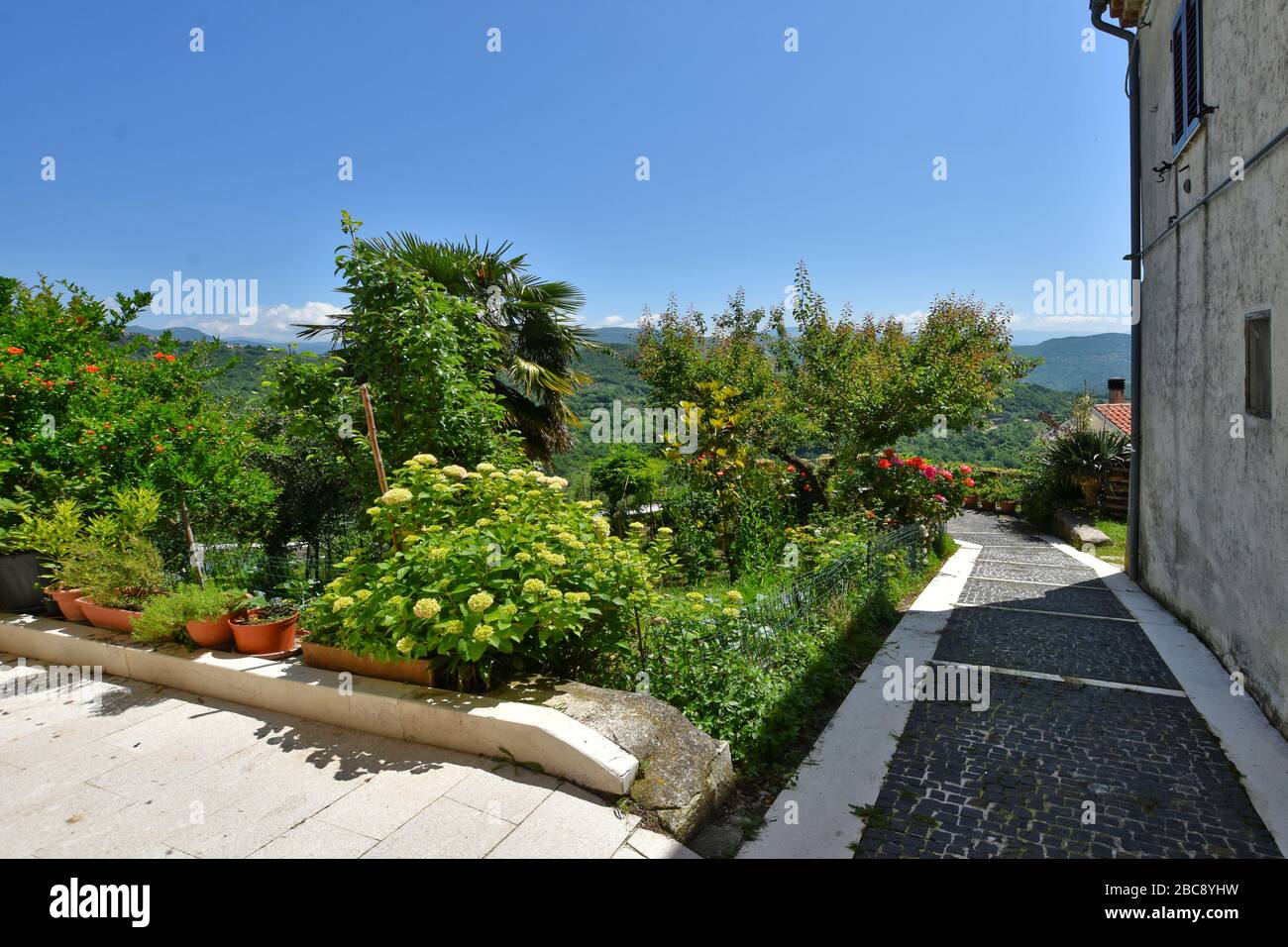 A narrow street between the houses of Scapoli, a village in the Molise ...