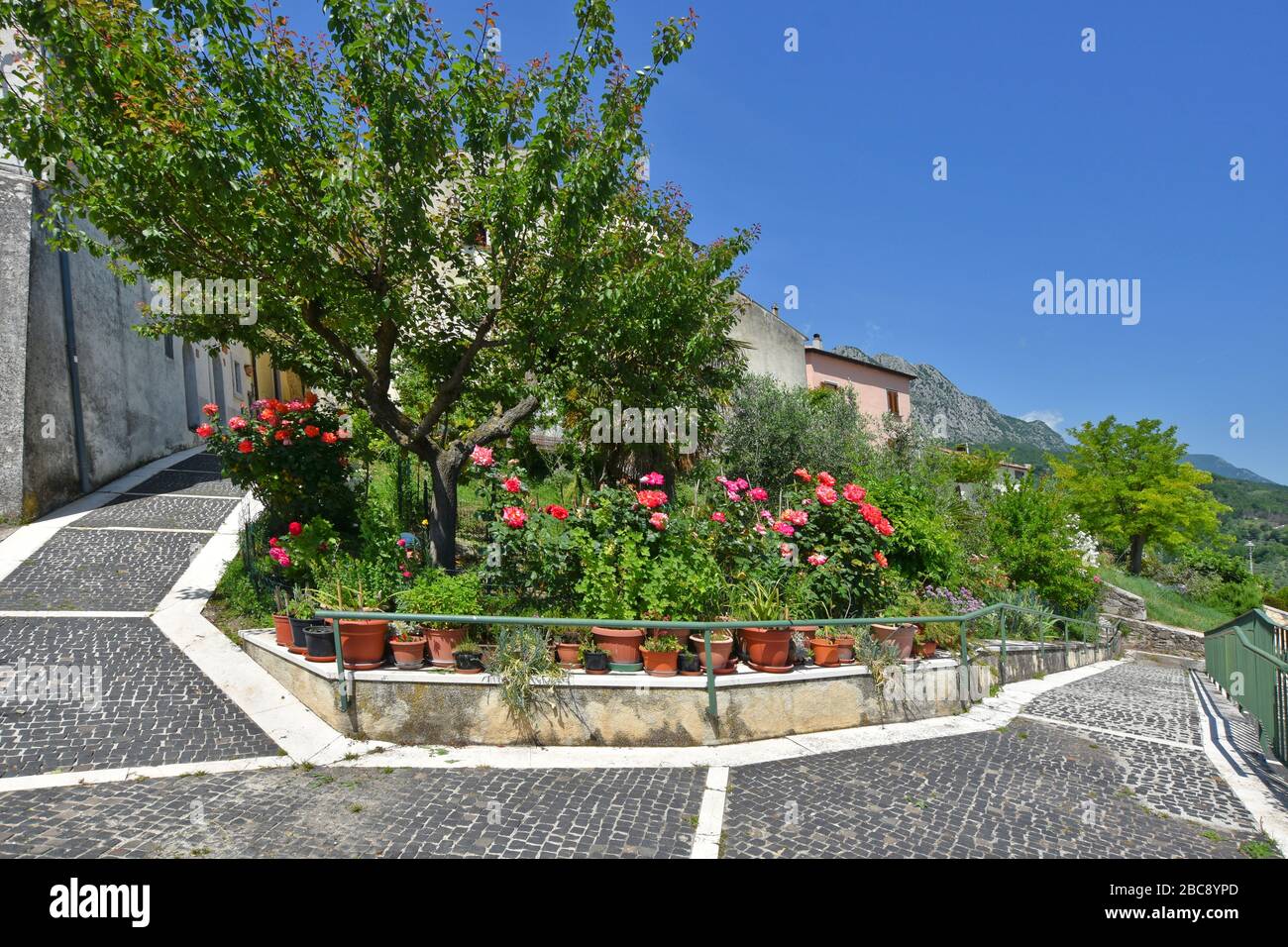 A narrow street between the houses of Scapoli, a village in the Molise ...