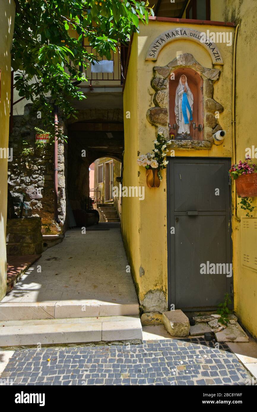 A narrow street between the houses of Scapoli, a village in the Molise ...