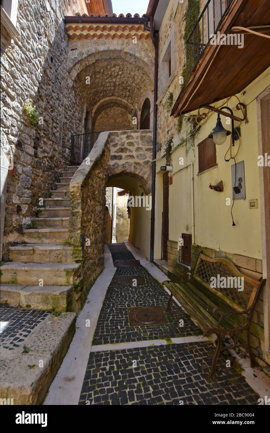 A narrow street between the houses of Scapoli, a village in the Molise ...