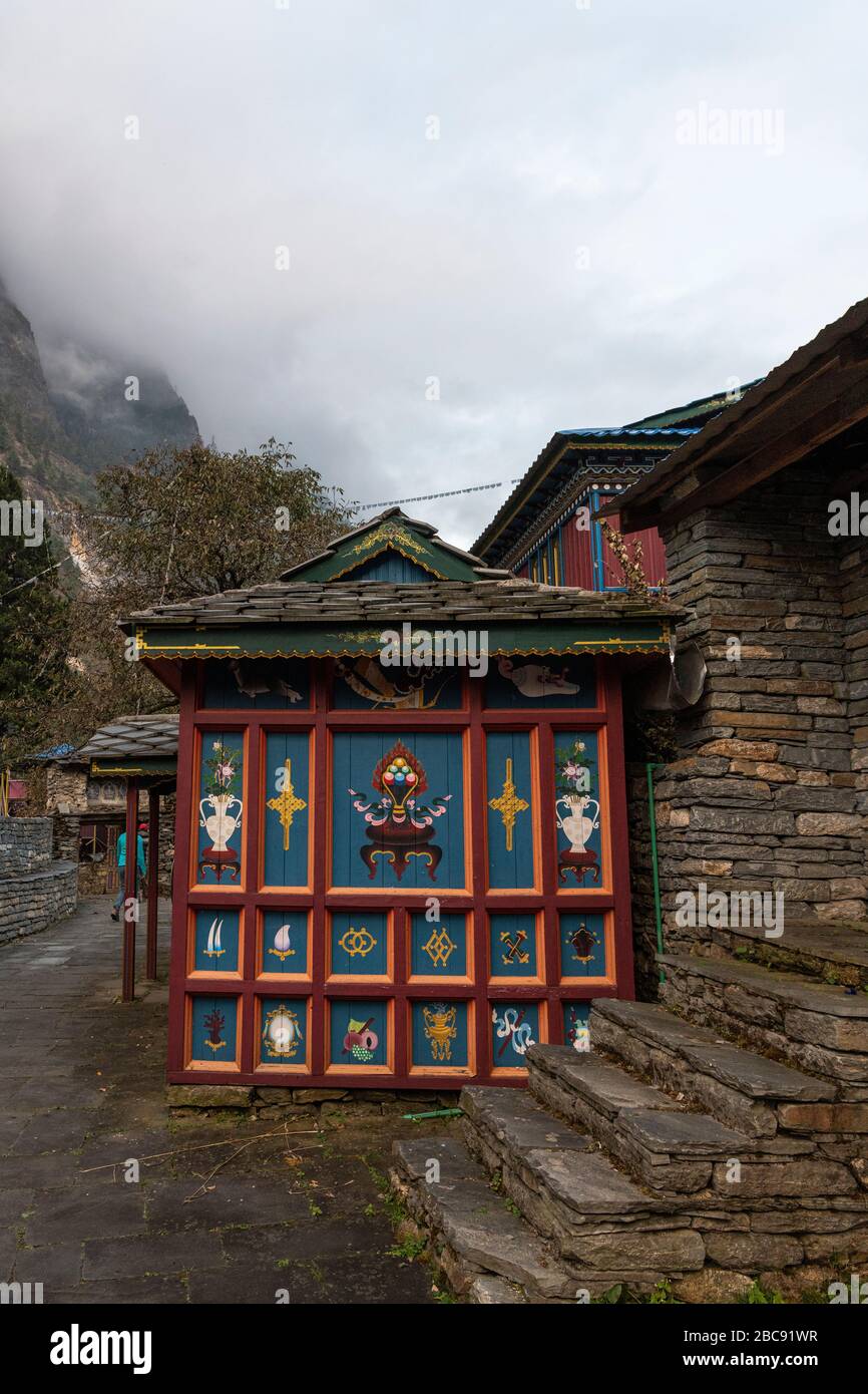 Colorfully painted house in Namrung, Nepal Stock Photo - Alamy