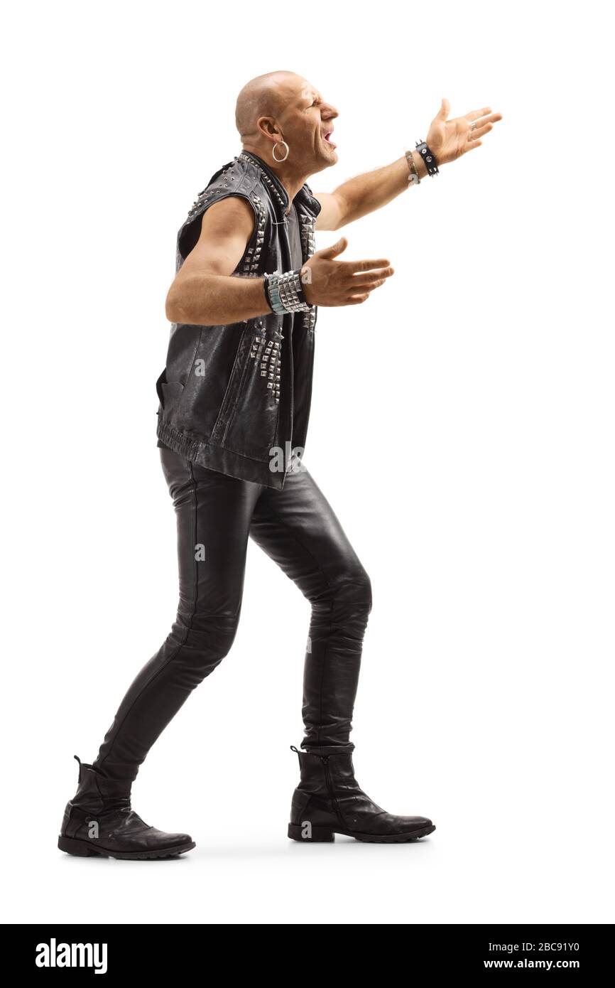 Full length profile shot of an angry punk shouting isolated on white ...