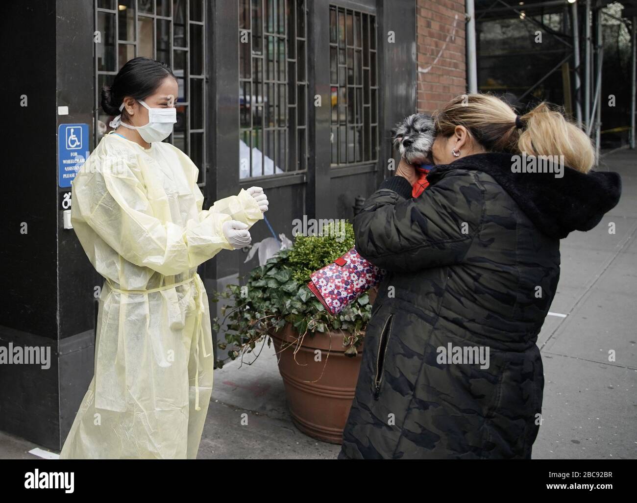 New York, United States. 03rd Apr, 2020. Hila Revilla of Queens sobs ...