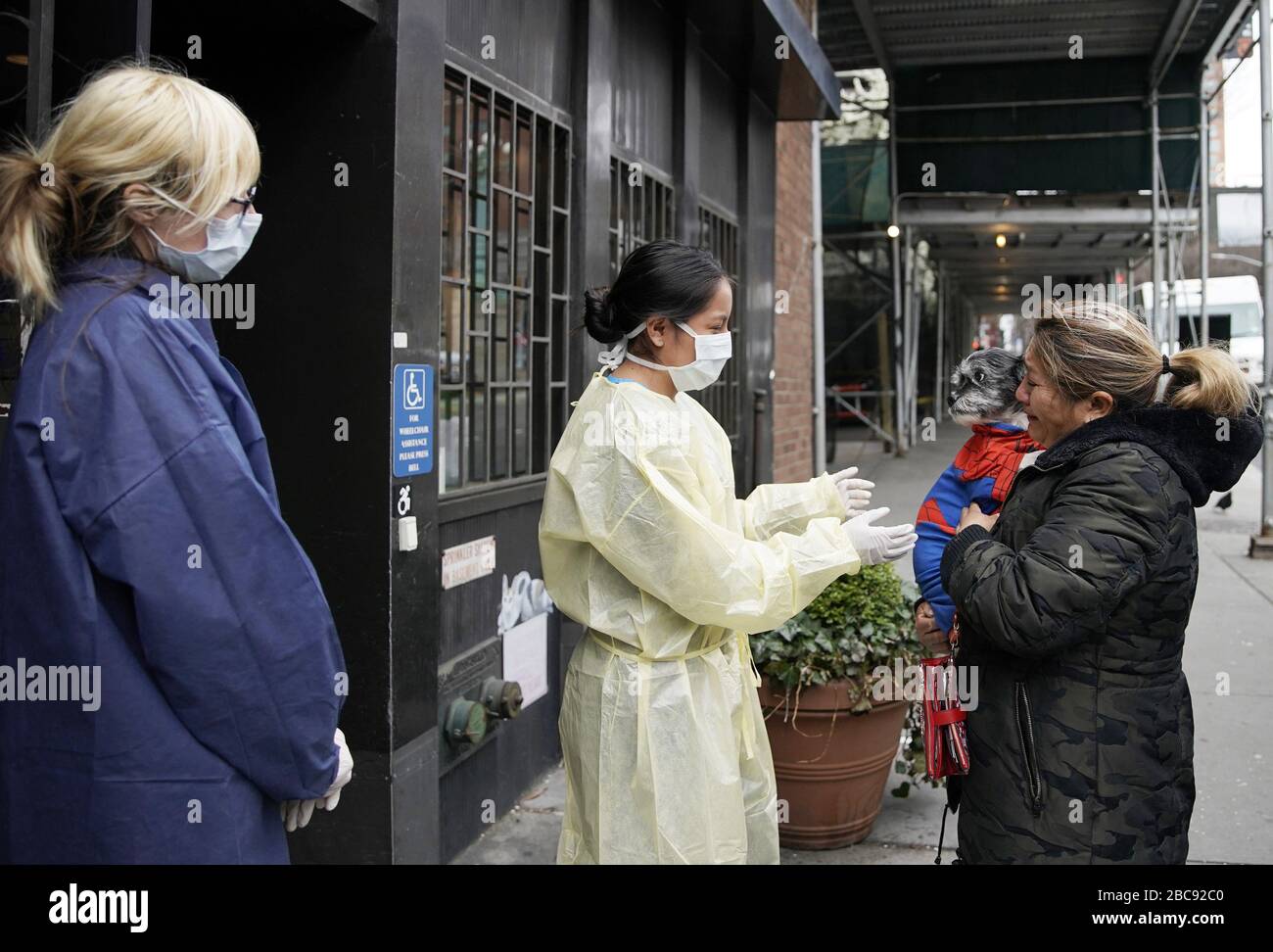 New York, United States. 03rd Apr, 2020. Hila Revilla of Queens sobs ...