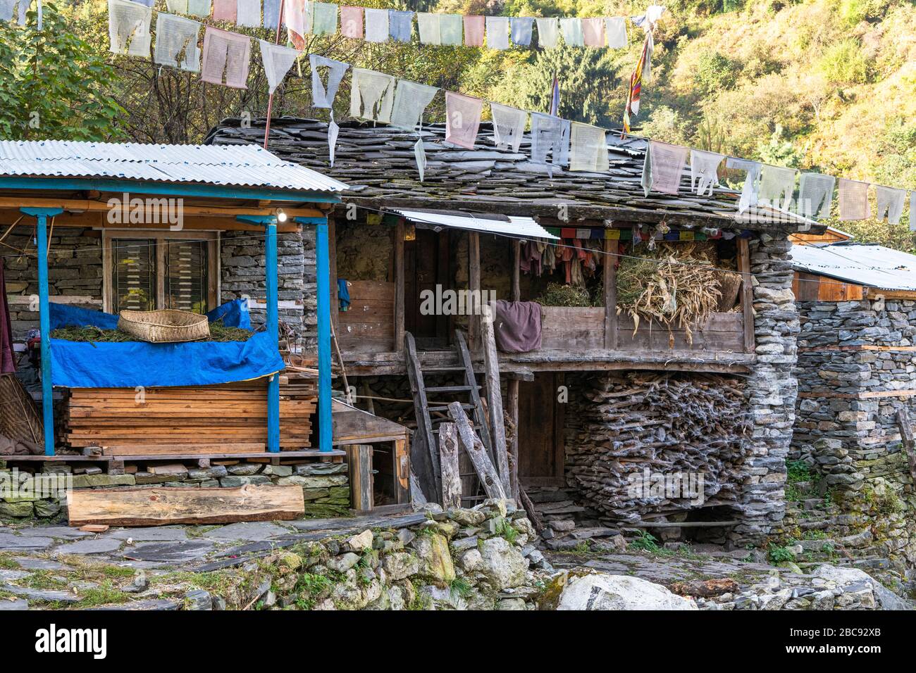 Simple stone house near Namrung, a mountain village in Nepal Stock ...