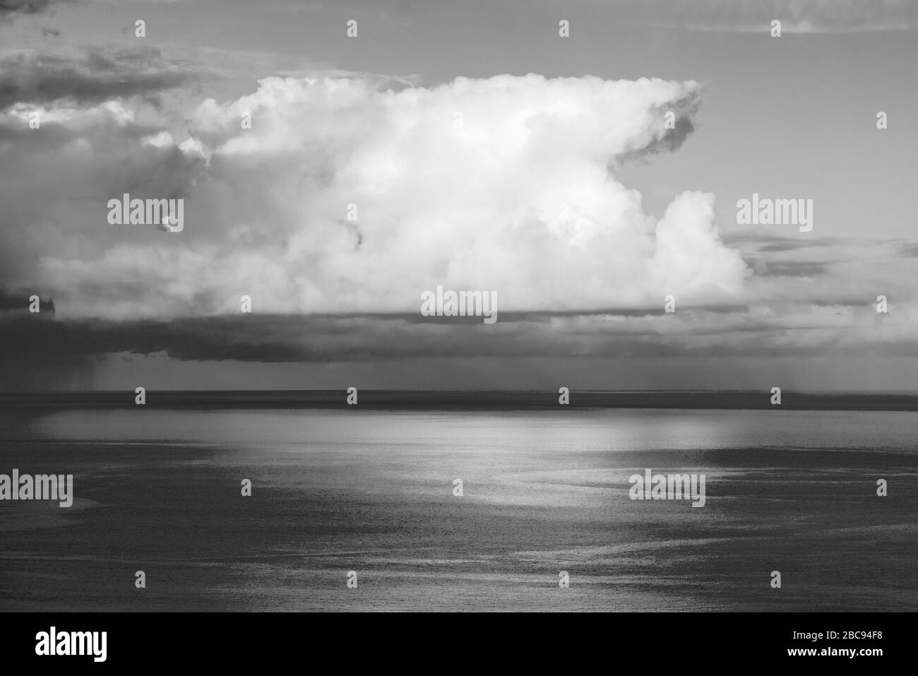 Cumulus clouds over pacific ocean Black and White Stock Photos & Images ...
