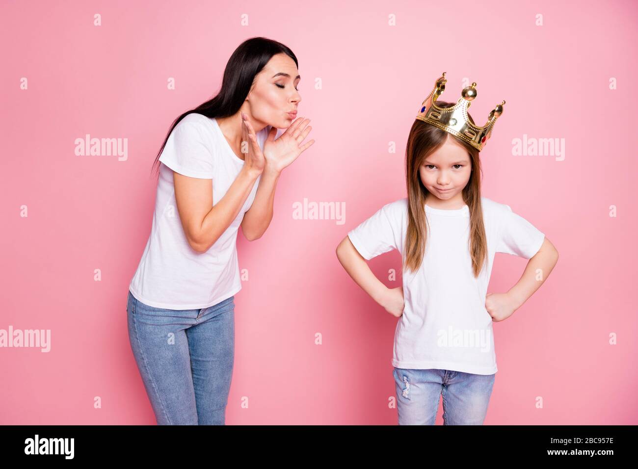 Photo of overjoyed obsessed mommy blowing kisses little angry spoiled ...