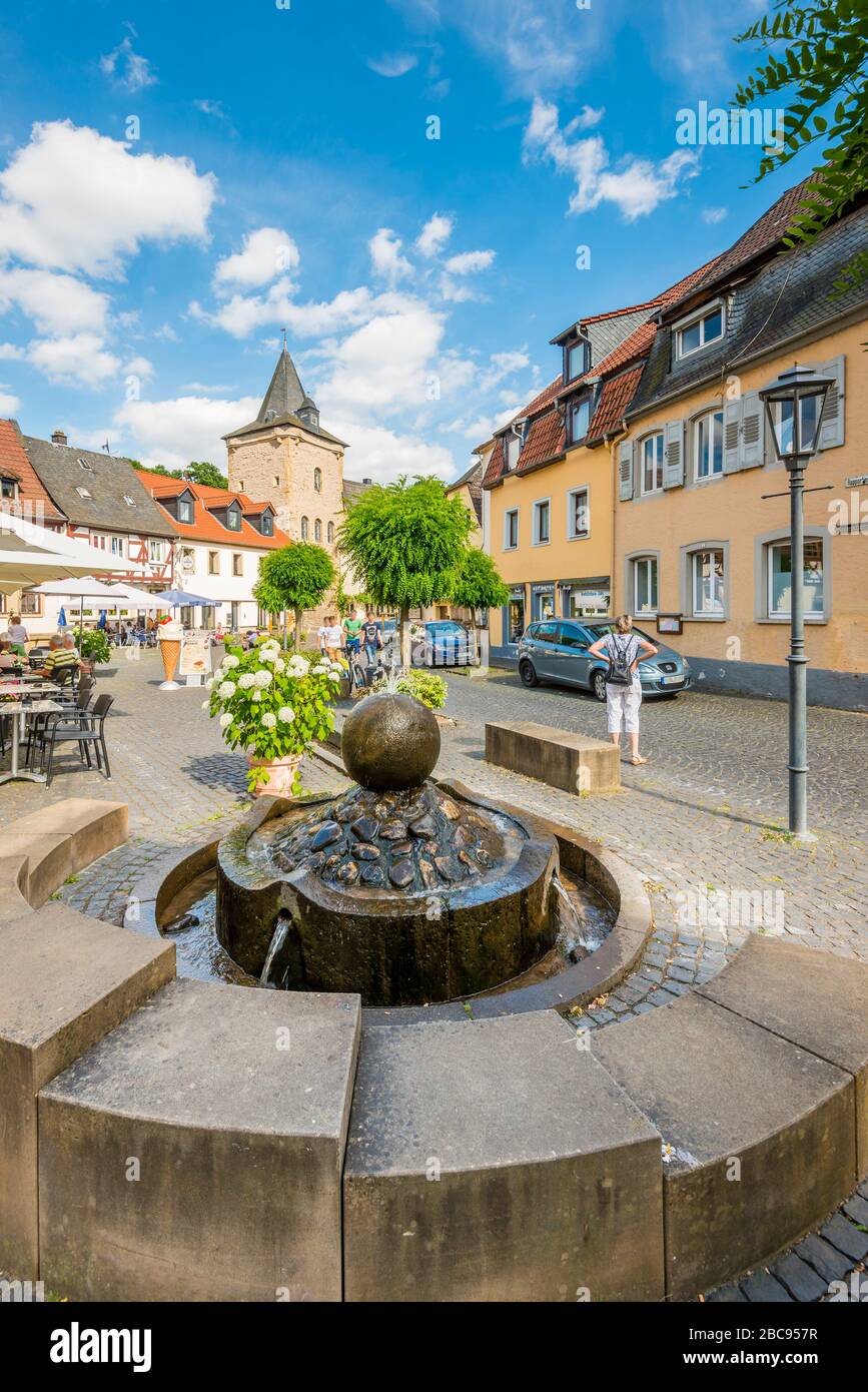 Fountain in front of Untertor in the historic old town of Meisenheim am ...