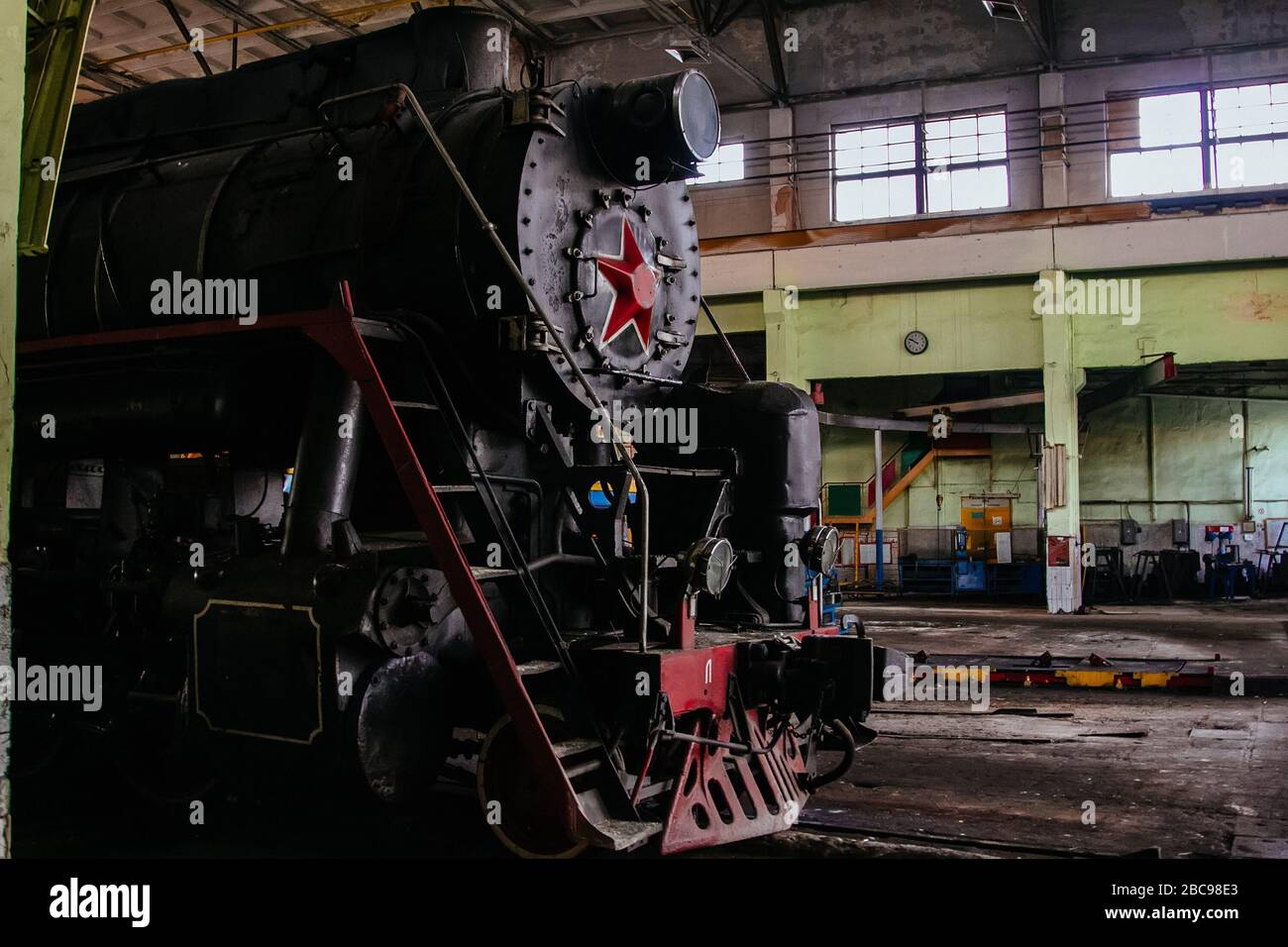 Old Soviet steam locomotive at the train depot Stock Photo - Alamy