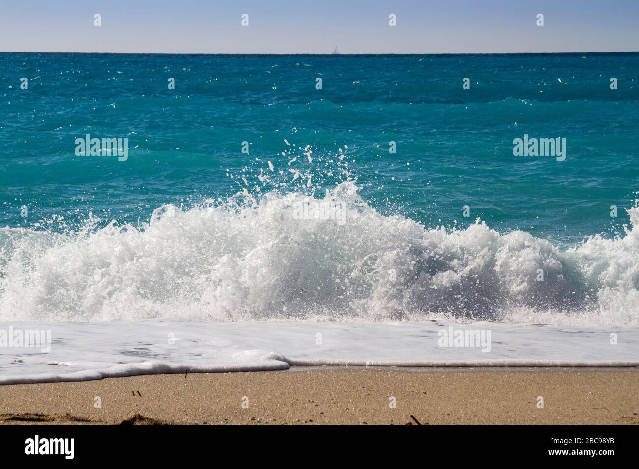 turquoise water wave by the beach Stock Photo - Alamy