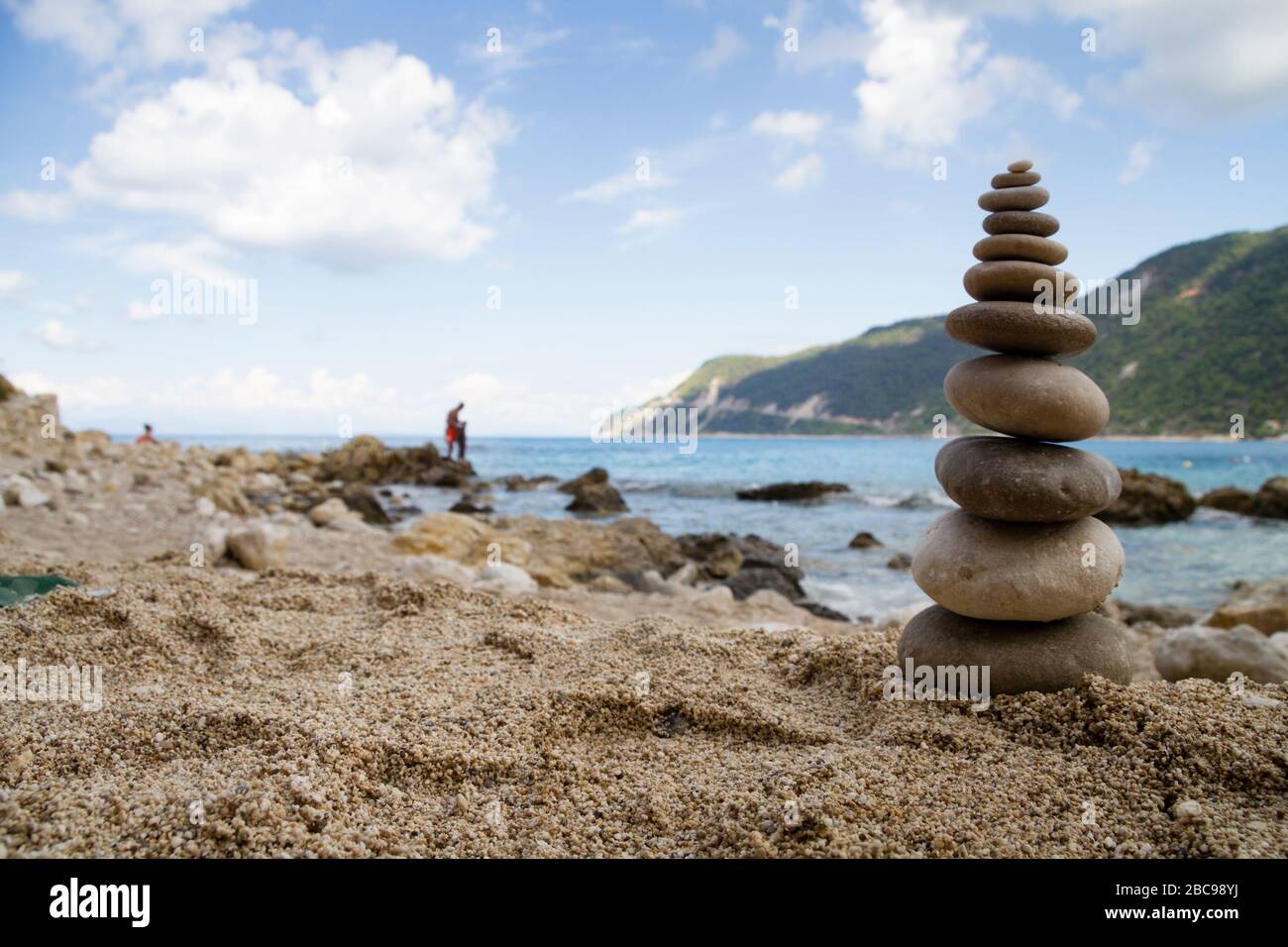 stone pyramid balance by the sea Stock Photo - Alamy