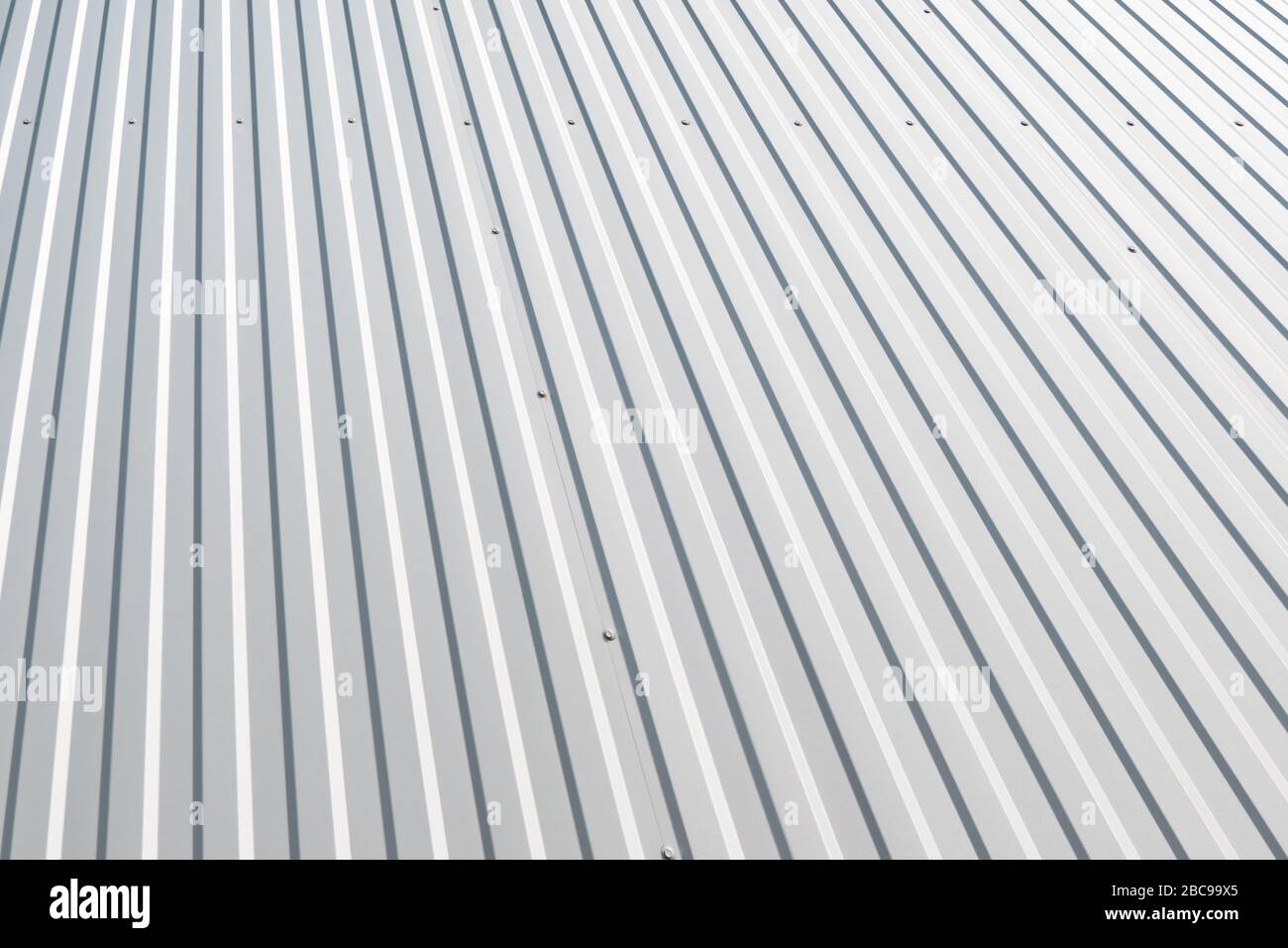 White Corrugated metal sheet surface of the wall. Galvanize steel ...