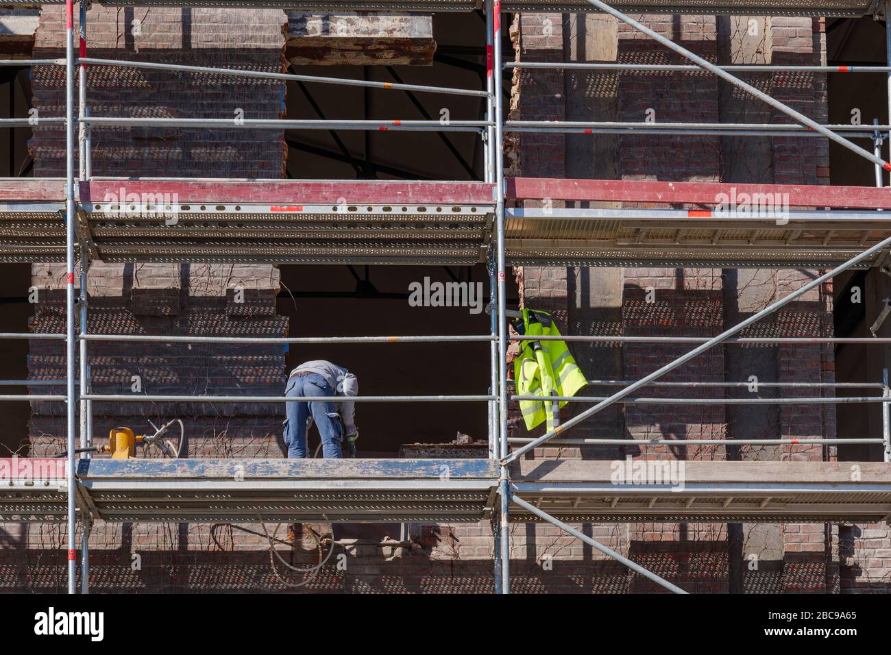 Front view of scaffolds in front of old historical building with ...