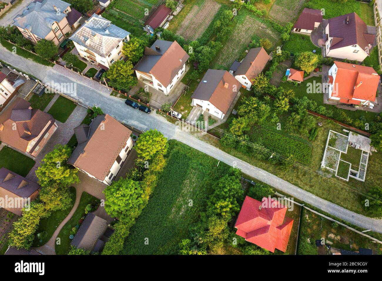 Aerial landscape of small town or village with rows of residential ...
