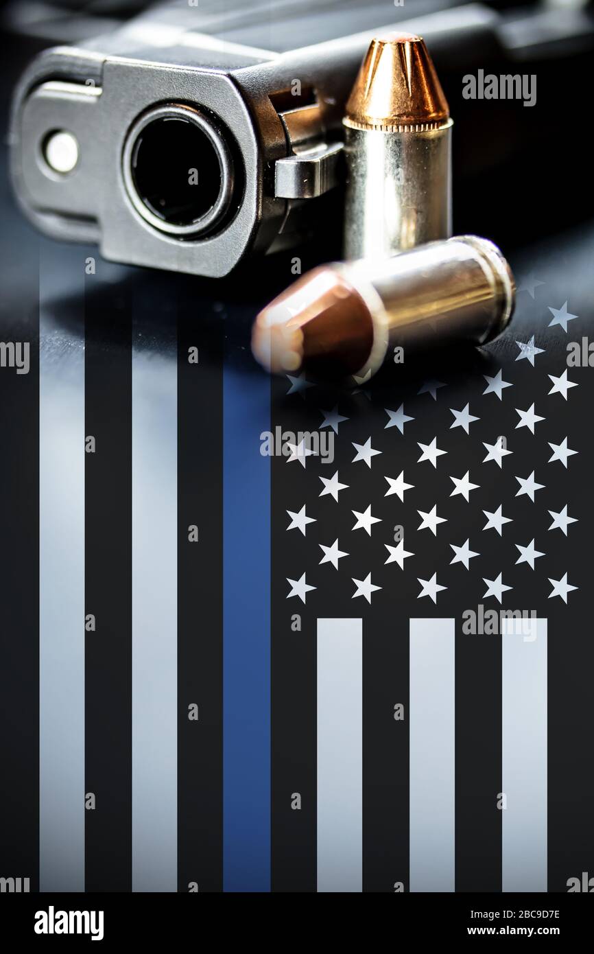 A police flag background with gun and bullets Stock Photo - Alamy