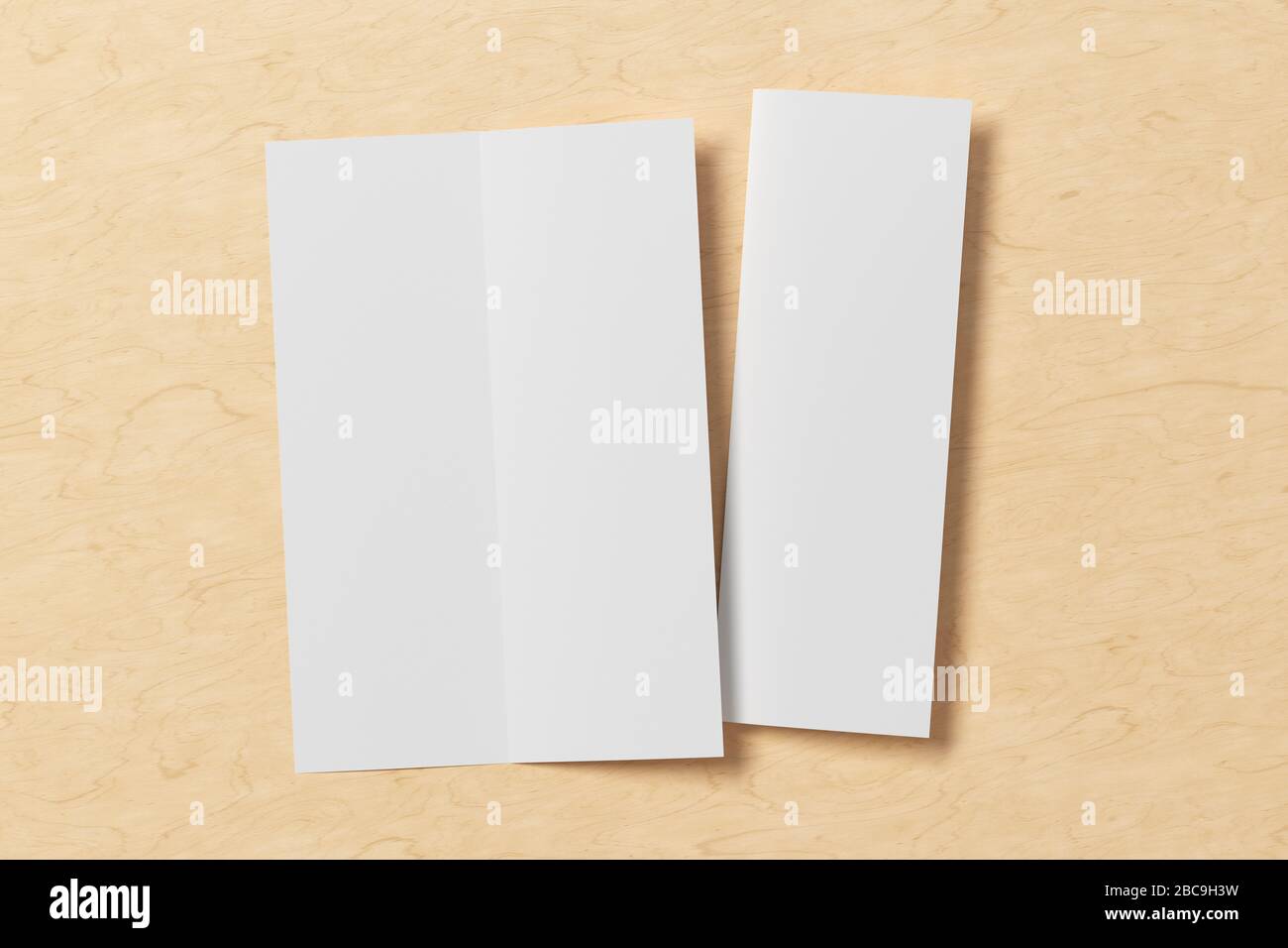 Blank vertical A4 leaflet on wooden background. Bi-fold or half-fold ...