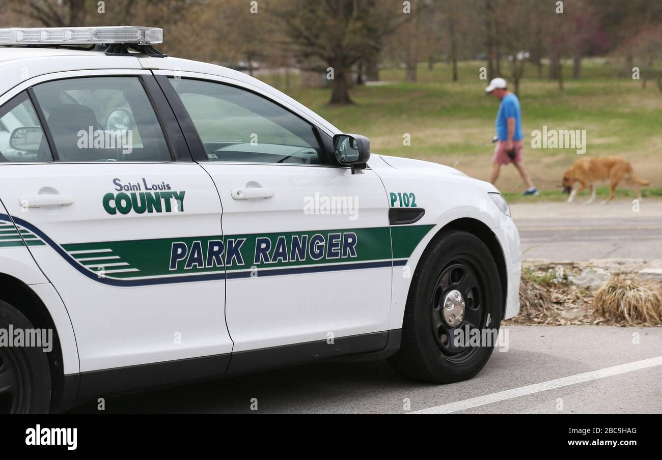 Ladue, United States. 03rd Apr, 2020. People continue to walk in Tillis ...